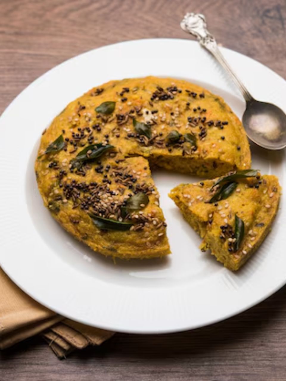 Handvo Recipe હાંડવો રેસીપી ટીપ્સ સરળ હાંડવો રેસીપી સ્નેક્સ રેસીપી ટીપ્સ